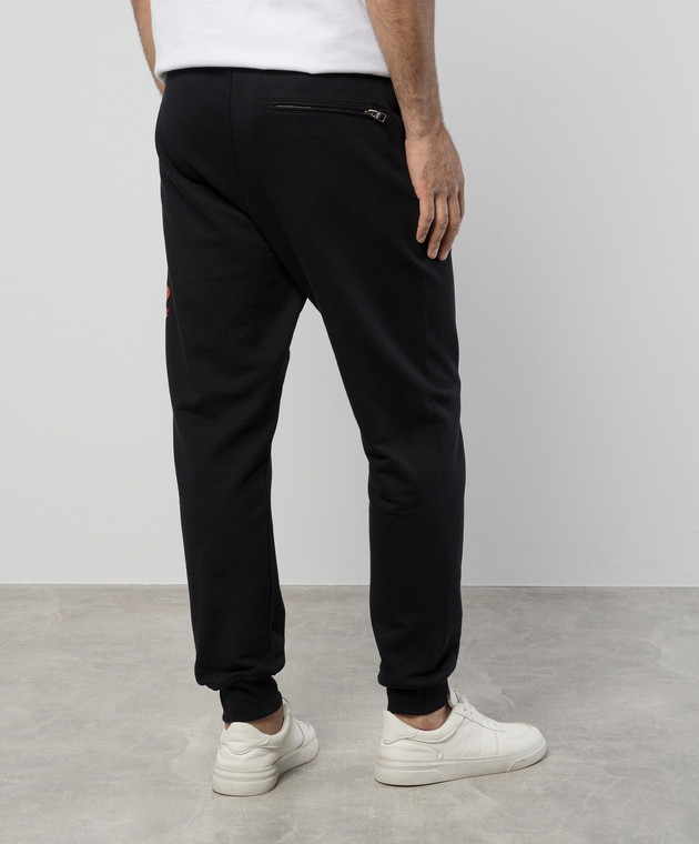 Alexander McQueen - Pantalon de jogging noir avec imprimé Alexander McQueen - Pantalon de jogging noir avec imprimé